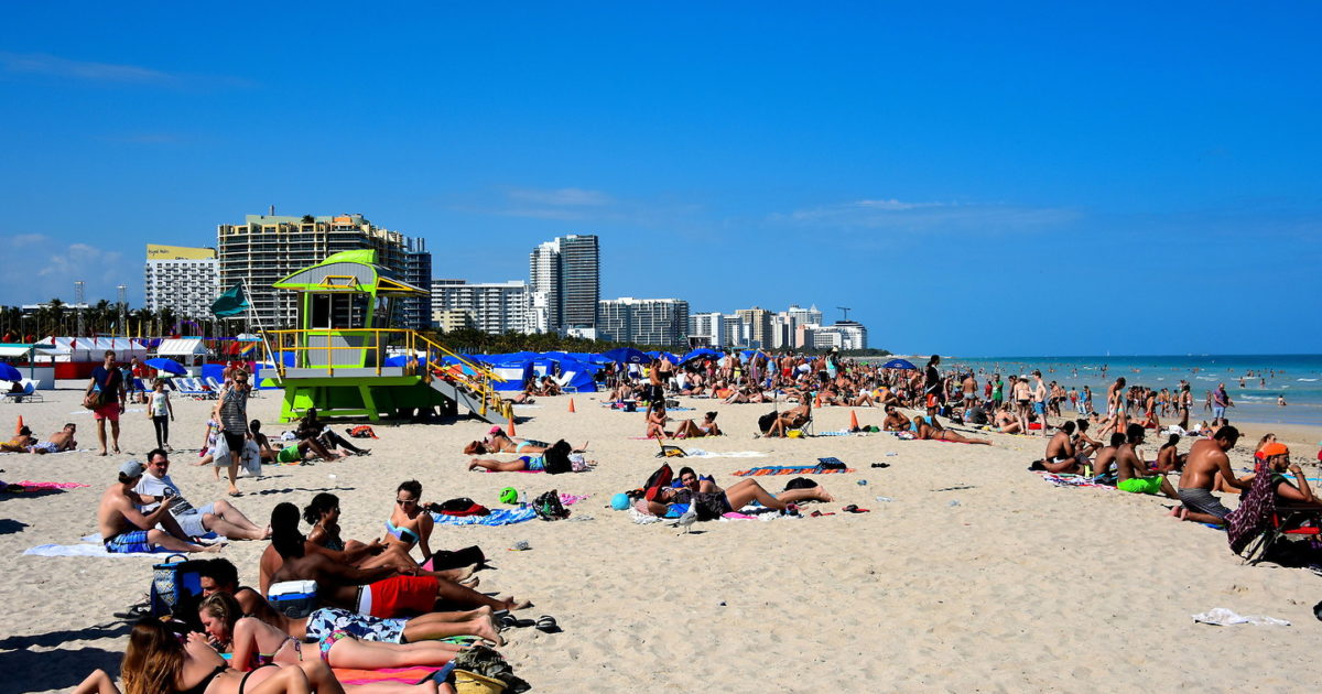 Crowds Sunning at South Beach in Miami Beach, Florida - Encircle Photos