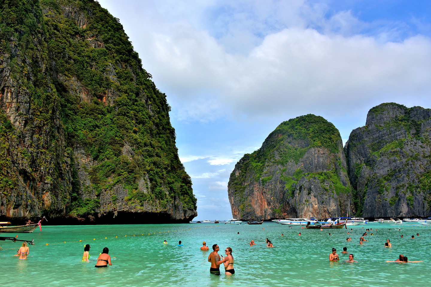 Tourists Swimming at Maya Bay on Phi Phi Ley, Thailand - Encircle Photos
